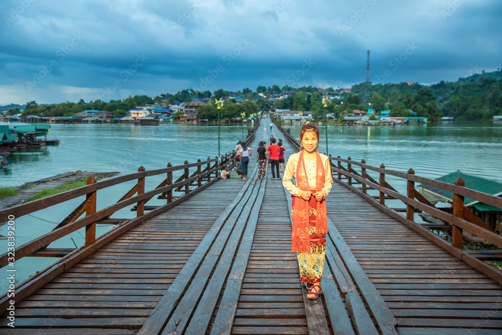 Thai women get dress traditional costume of Mon tribal at Mon village ...