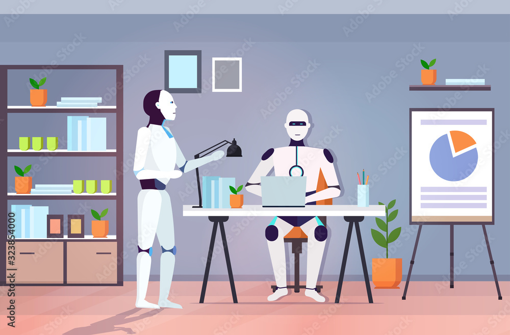 modern robots team using laptop robotic coworkers brainstorming at ...