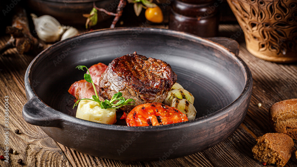 European cuisine in Ukrainian style. Beef steak with mashed potatoes ...