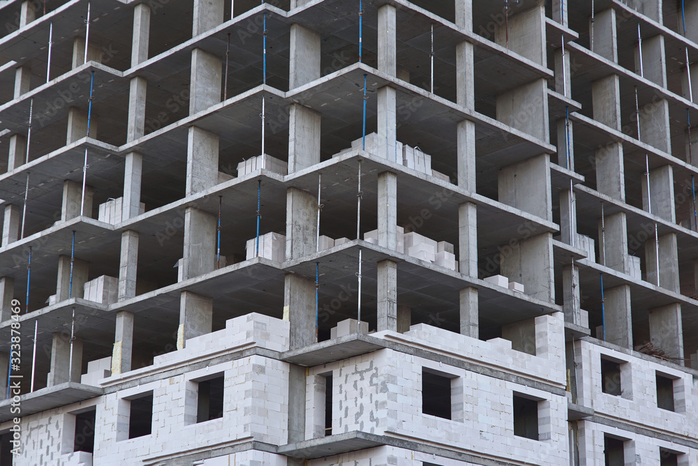 Foto de Monolithic concrete frame of new building. Construction of ...