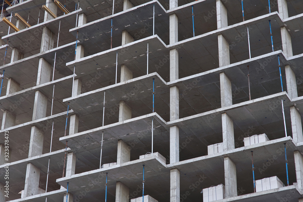 Monolithic concrete frame of new building. Construction of monolithic ...