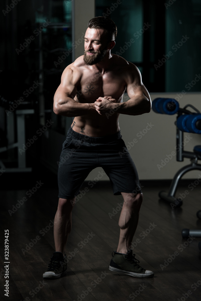 Bodybuilder Performing Most Muscular Pose Stock Photo | Adobe Stock