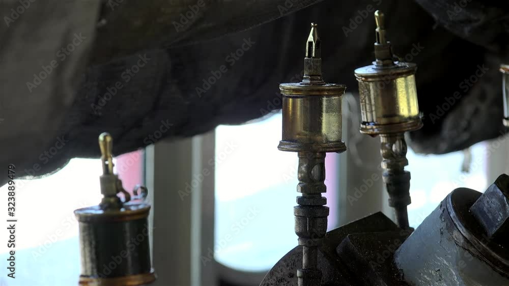 Moving Grease flasks in the Steam Engine Room of the steamboat. vídeo ...