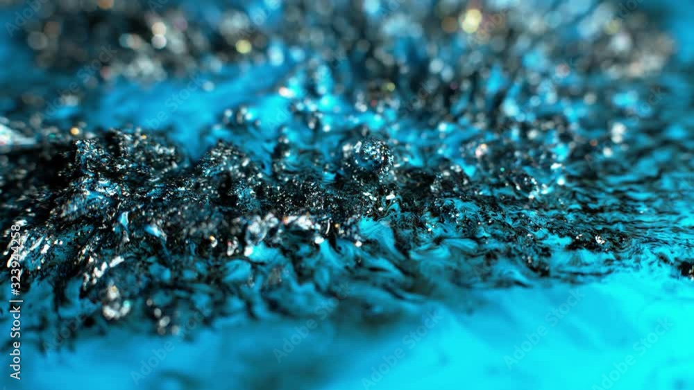 Magnetic blue Iron Filings moved by magnet force Stock Video | Adobe Stock