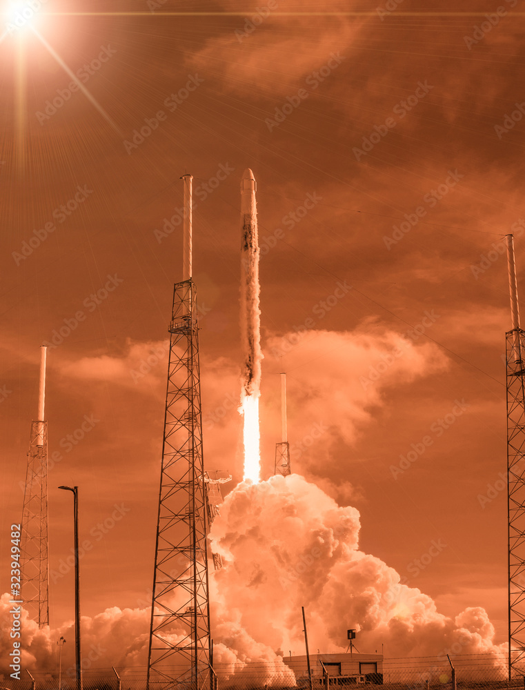 Sunlight and rocket. The elements of this image furnished by NASA ...