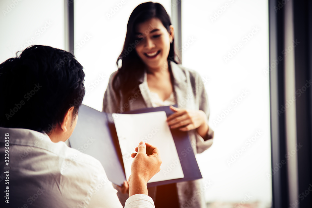 Asian manager rise hand to ask question during sale woman present ...
