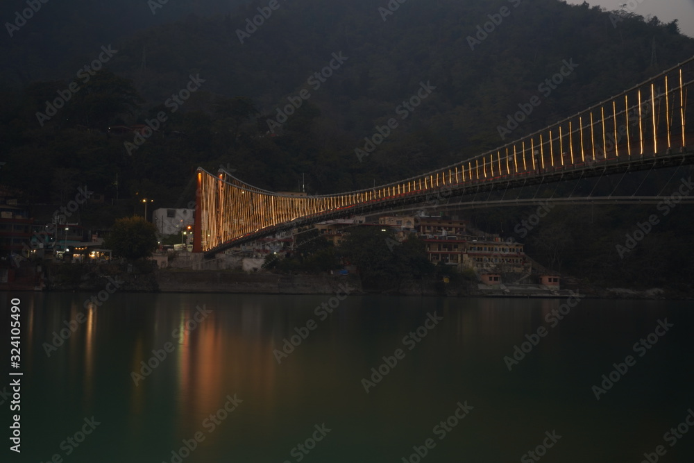 Ram Jhula This long famous pedestrian suspension bridge crossing the ...