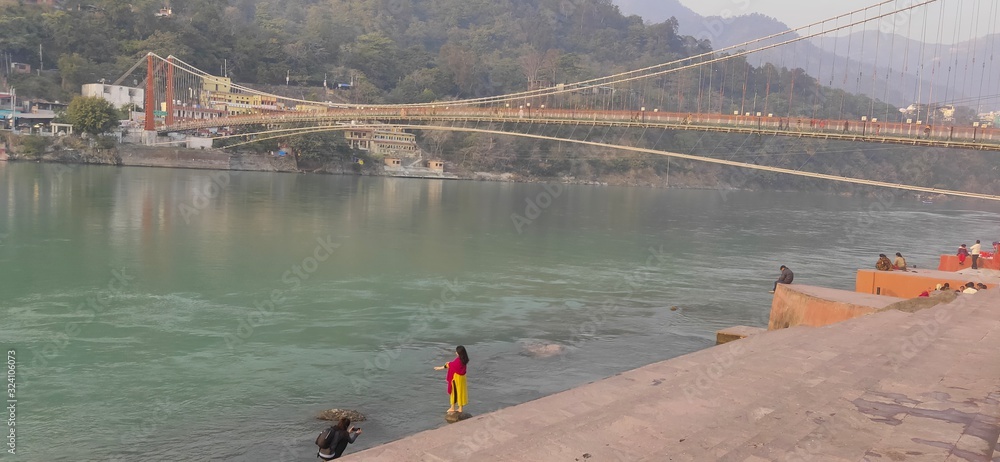 Ram Jhula This long famous pedestrian suspension bridge crossing the ...
