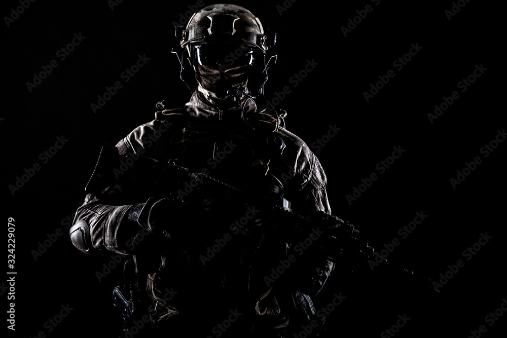 Army special operations forces soldier in mask and combat uniform ...