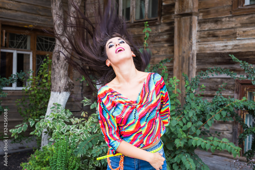 Street shaabi dance and urban dancer concept - Cheerful belly dancer ...