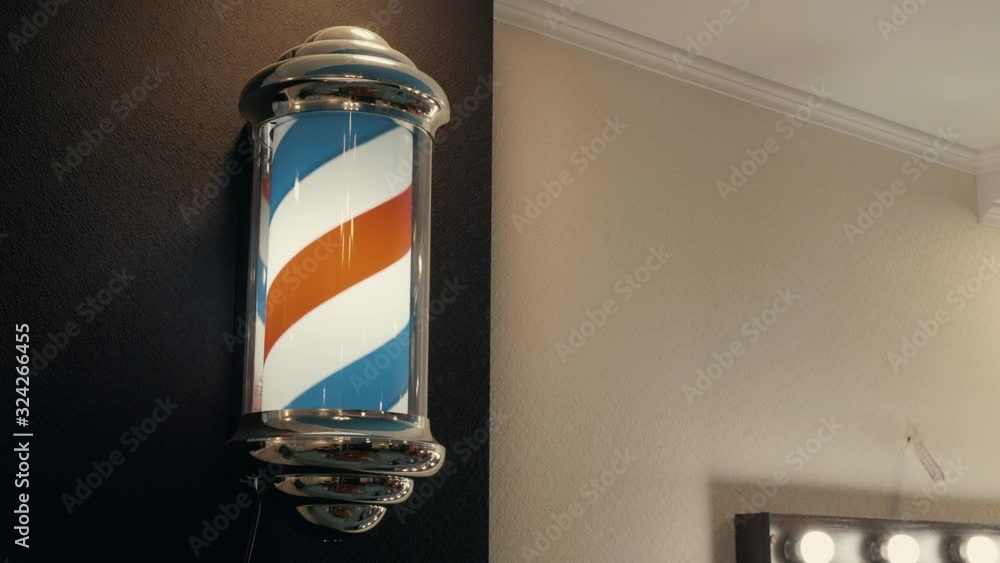 Barber pole sign spinning. Retro style barber shop sign. Barber shop ...