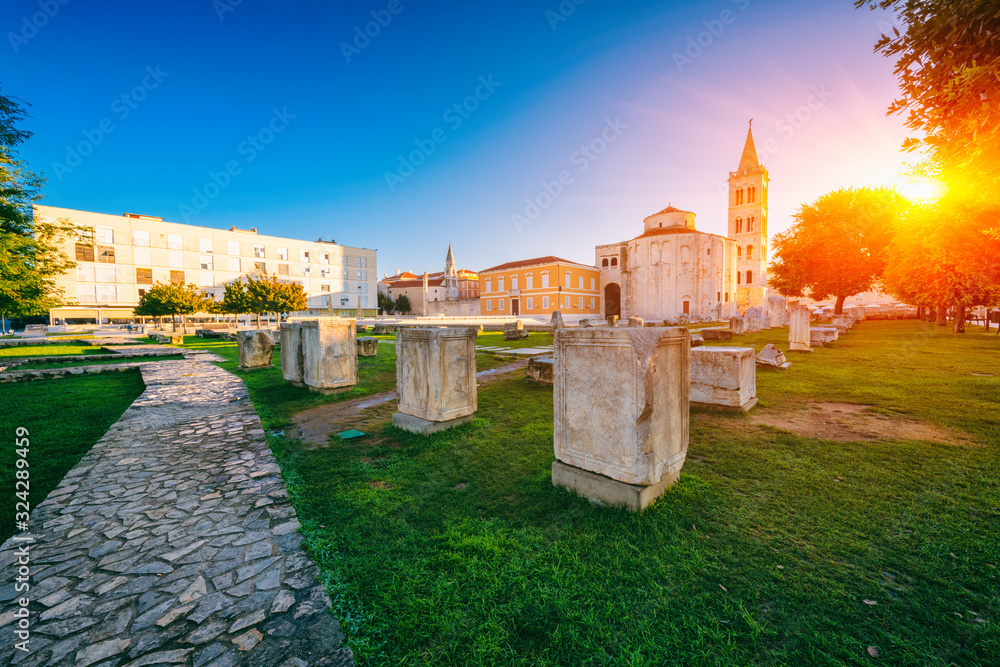 Old roman forum in Zadar at sunrise, church of St Donatus and cathedral ...