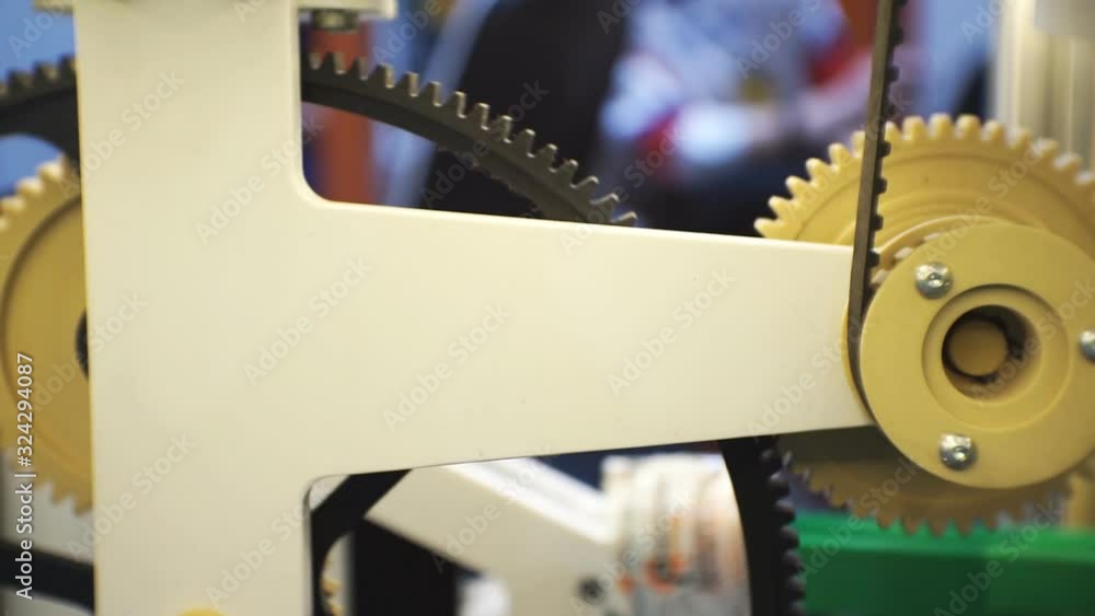 Rotating mechanical parts of various shapes and sizes. A complex ...