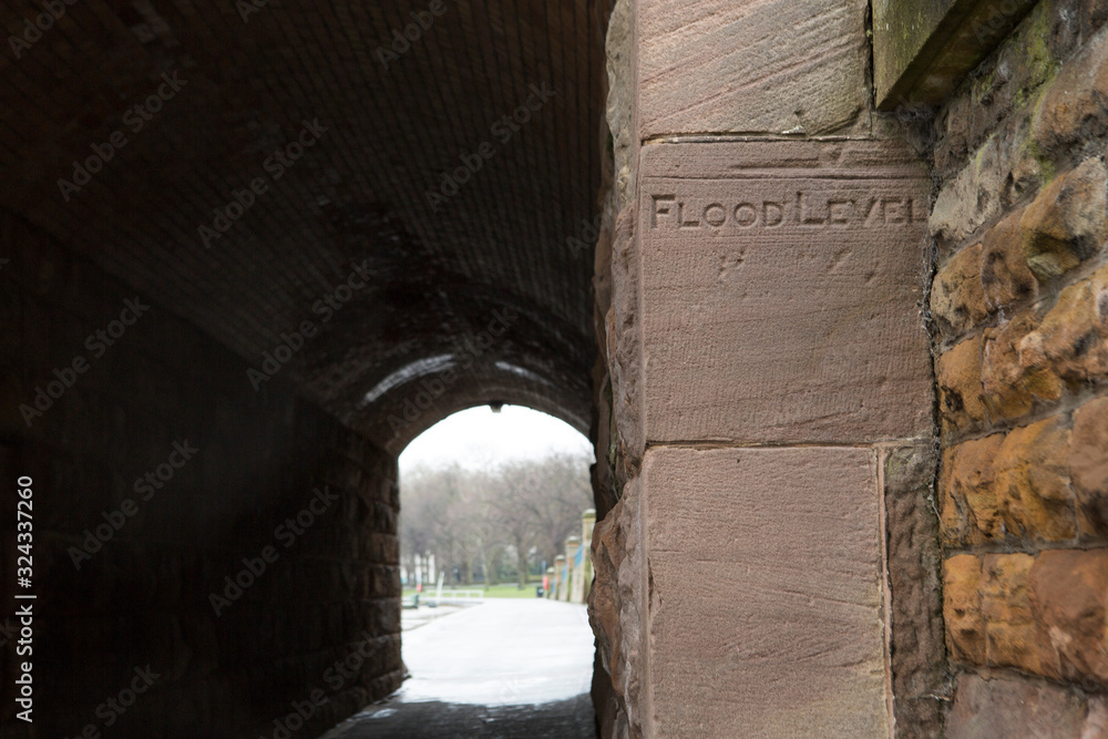 Flood level indicator next to footpath tunnel, River Trent, Trent ...
