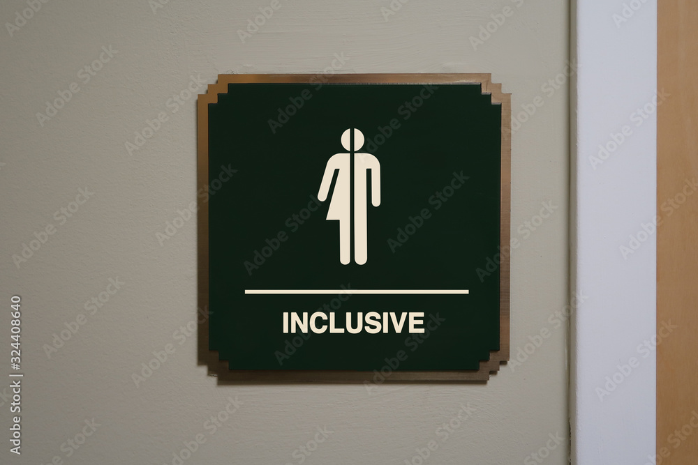 Gender neutral restroom sign that says, INCLUSIVE. Stock Photo | Adobe ...