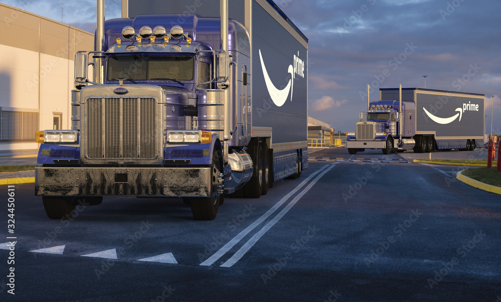 trucks with a semi-trailer with the Amazon Prime logo at the Amazon ...