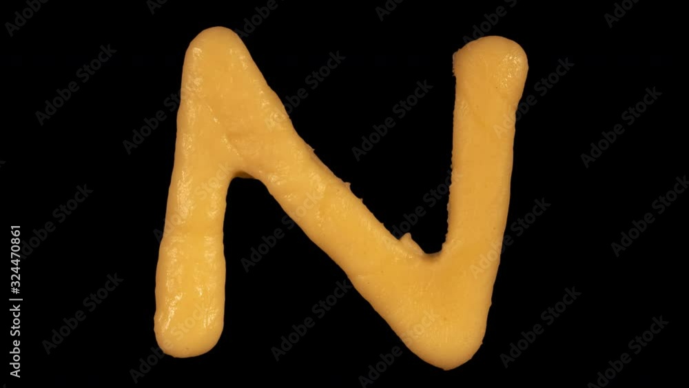 Cookie letter N, baking time lapse, top view, include two versions ...