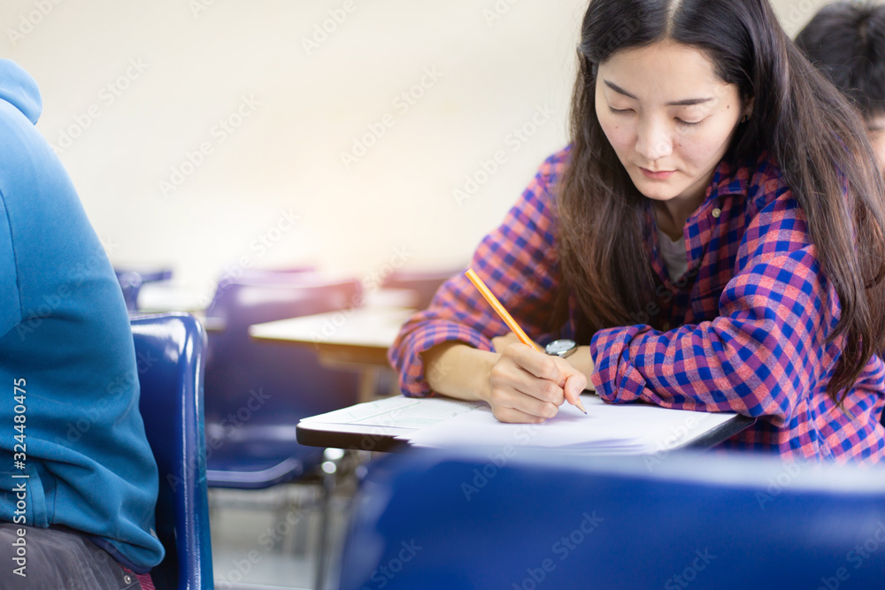 high school,university student study.hands holding pencil writing paper ...