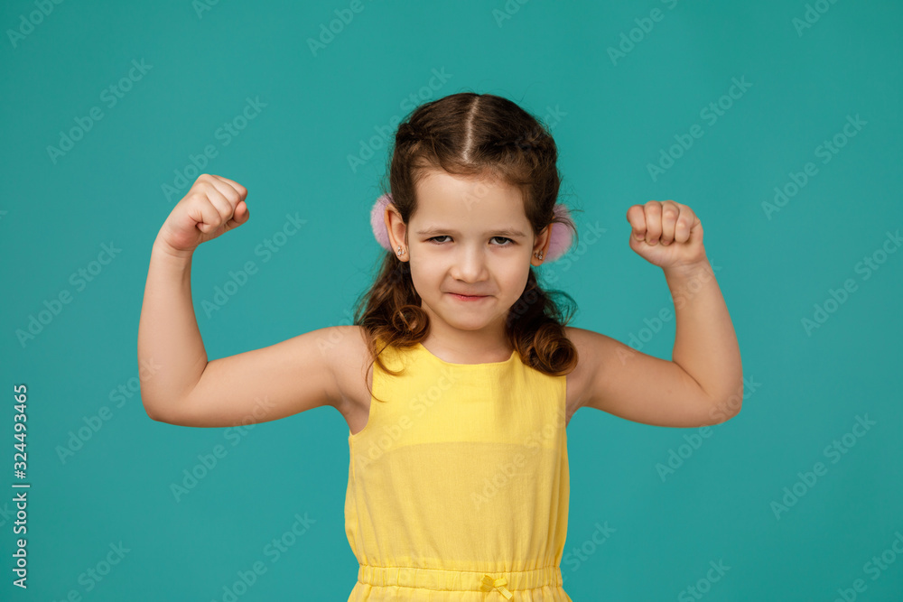 angry little child girl in dress raising fist frustrated and furious ...
