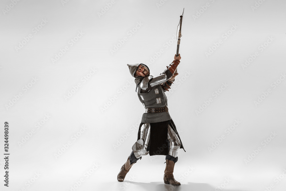 Brave armored knight with professional weapon fighting isolated on ...