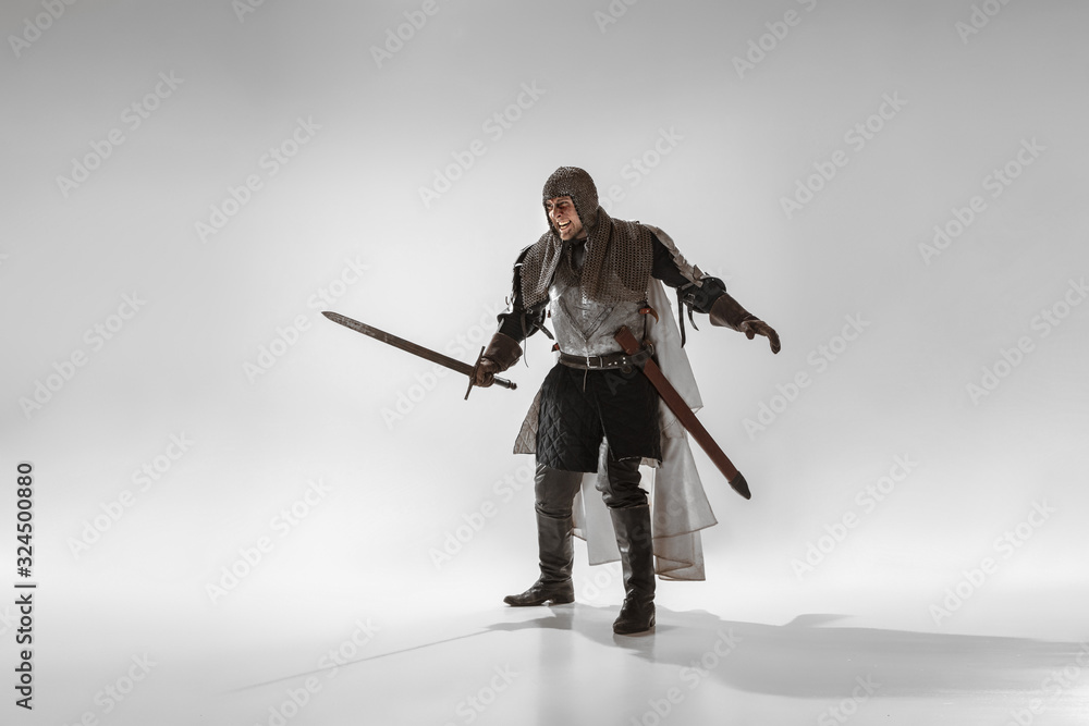 Brave armored knight with professional weapon fighting isolated on ...
