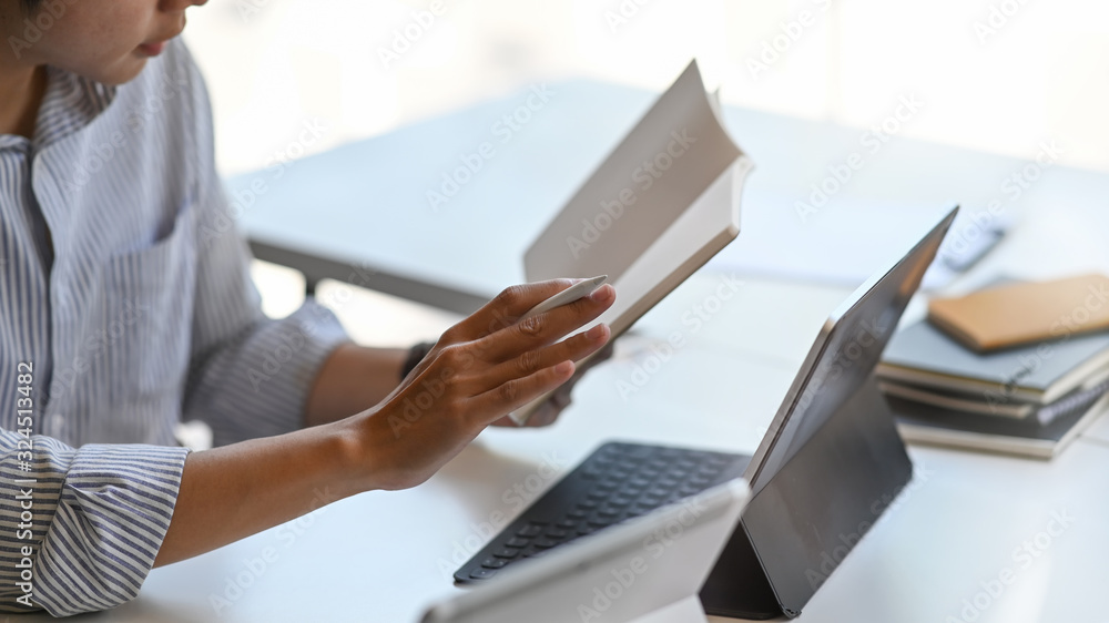 Cropped shot man working as accountant checking information while ...