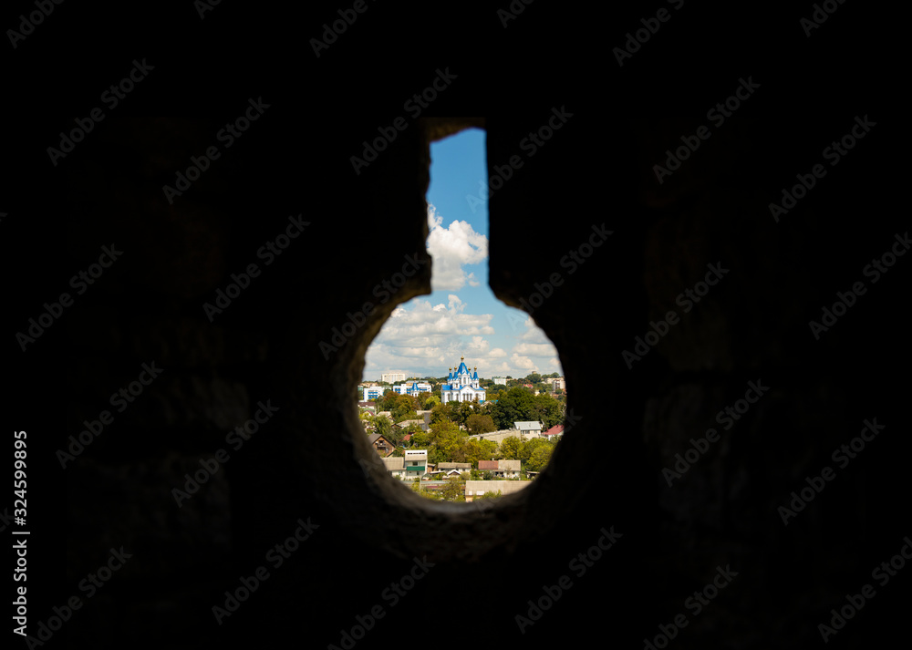 rural country side view with orthodox church on a hill frame work key ...