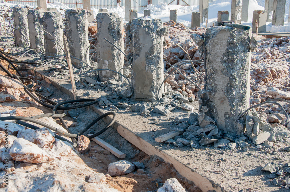 Demolition of concrete piles. Concrete base of the new building. Stock ...