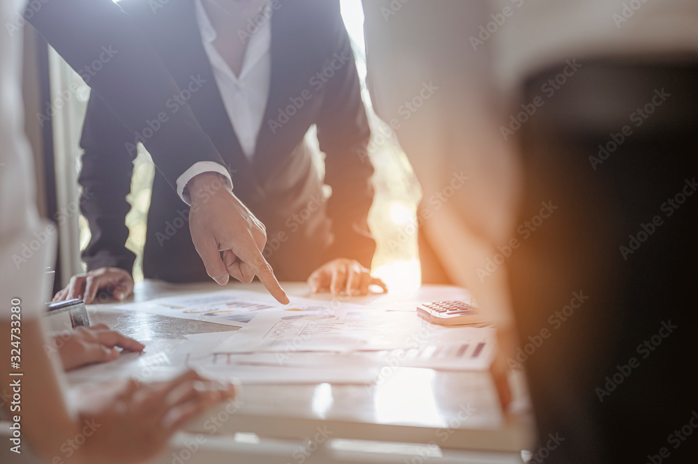 Business spends time planning a new financial project with team ...