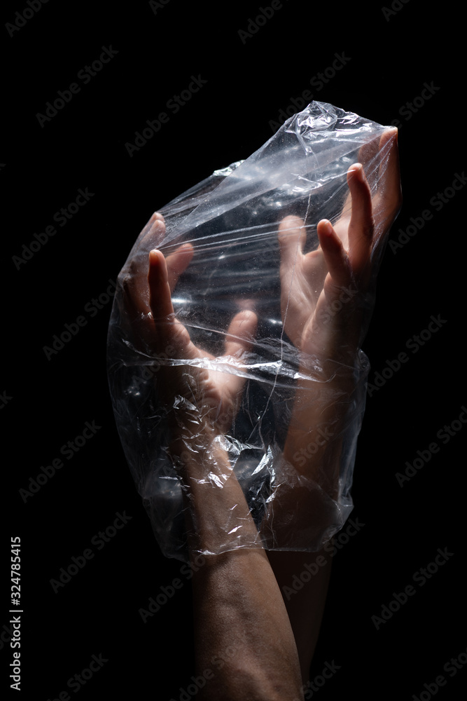 Ecological concept in Earth protection. Plastic bag refusal. Hands in ...