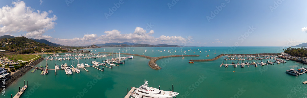 Panoramic marina town aerial. Airlie beach waterfront aerial view ...