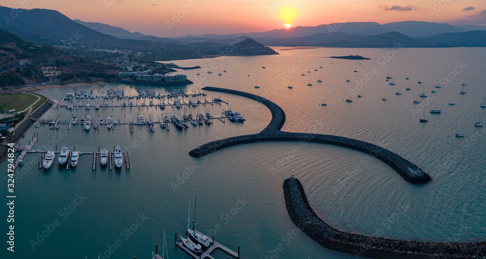 Sunset Panoramic marina town aerial. Airlie beach waterfront aerial ...