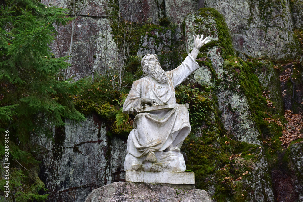 Väinemäinen playing on a kantele - statue of the hero of the epic ...