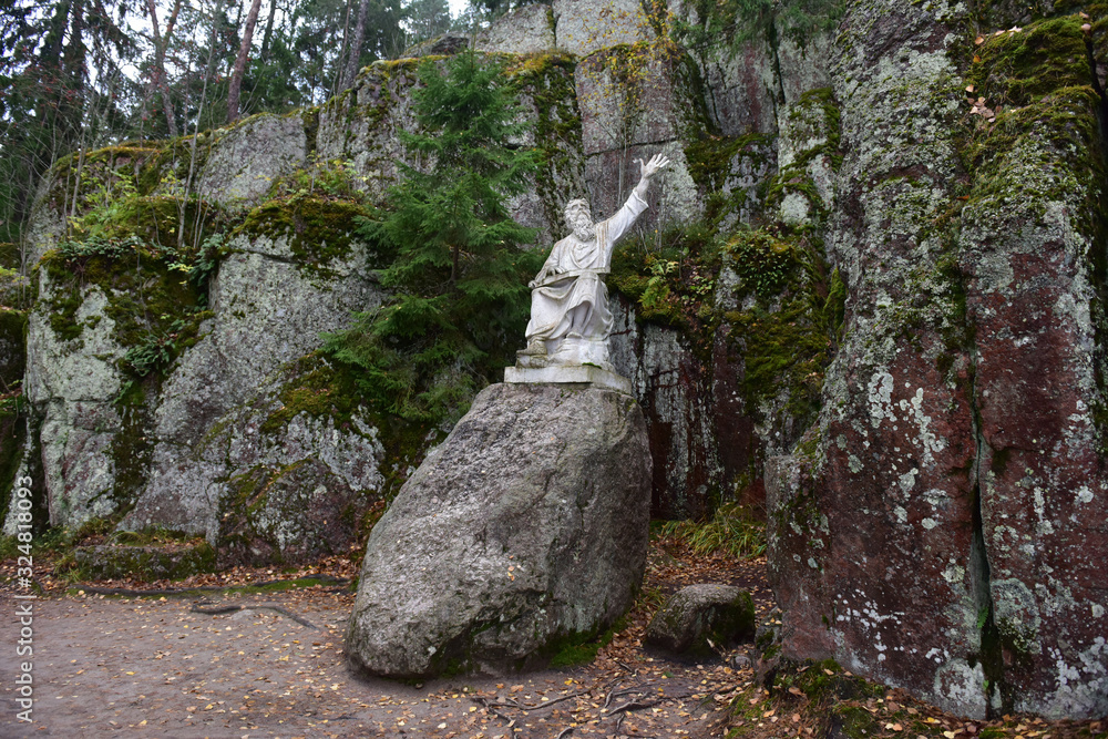 Väinemäinen playing on a kantele - statue of the hero of the epic ...