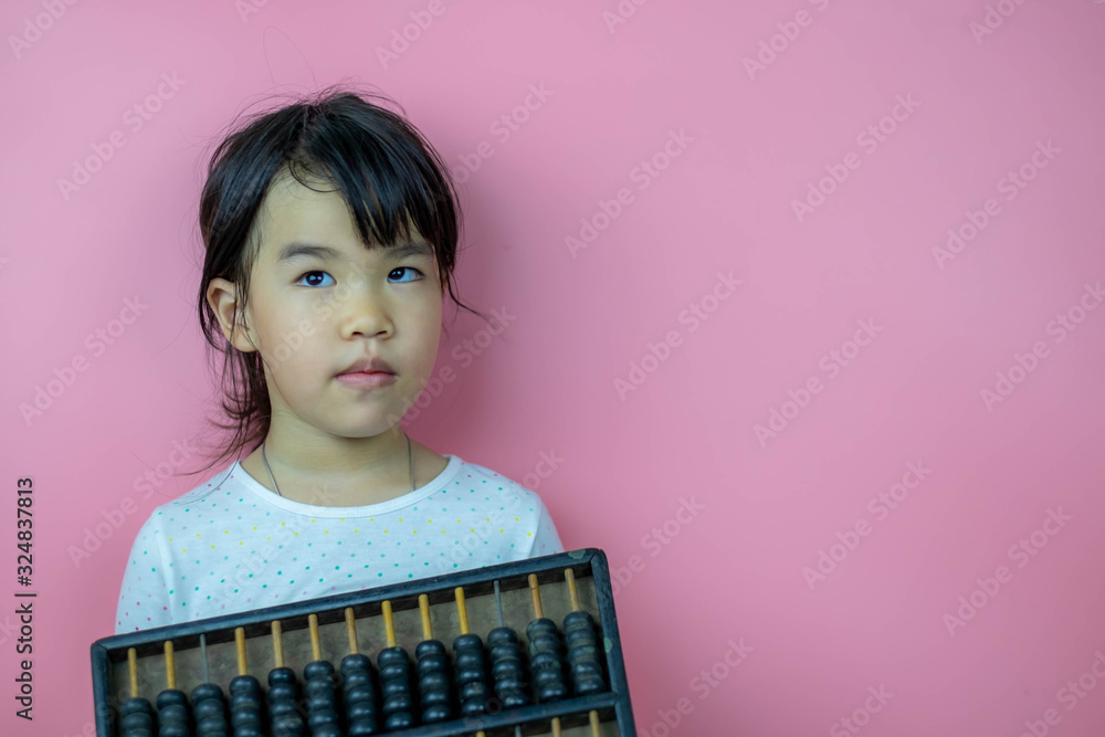 Asian Chinese little girl with abcus chinese calculator Stock Photo ...