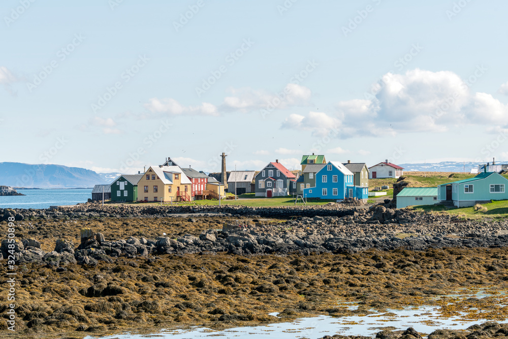 Colorful buildings and the charming city of Flatey Island in Iceland ...