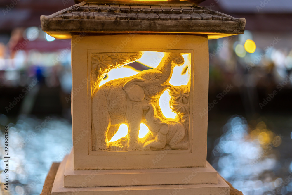 Lamp, elephant statue, father and son Illuminate the pathway At ...
