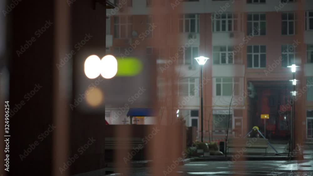 Safety in modern residential building, fenced yard, closed gate with ...