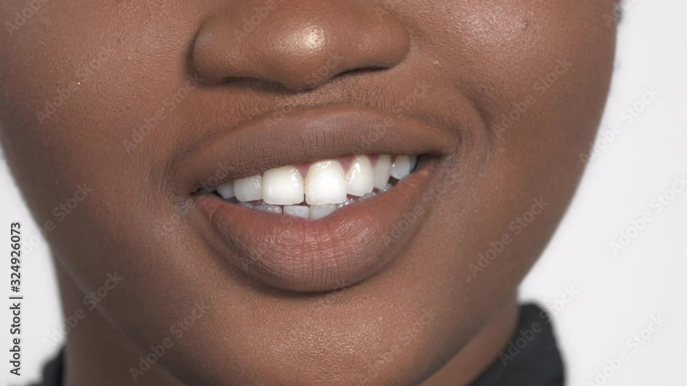 Vidéo Stock Hot air kiss of young African American woman. Sensual big ...