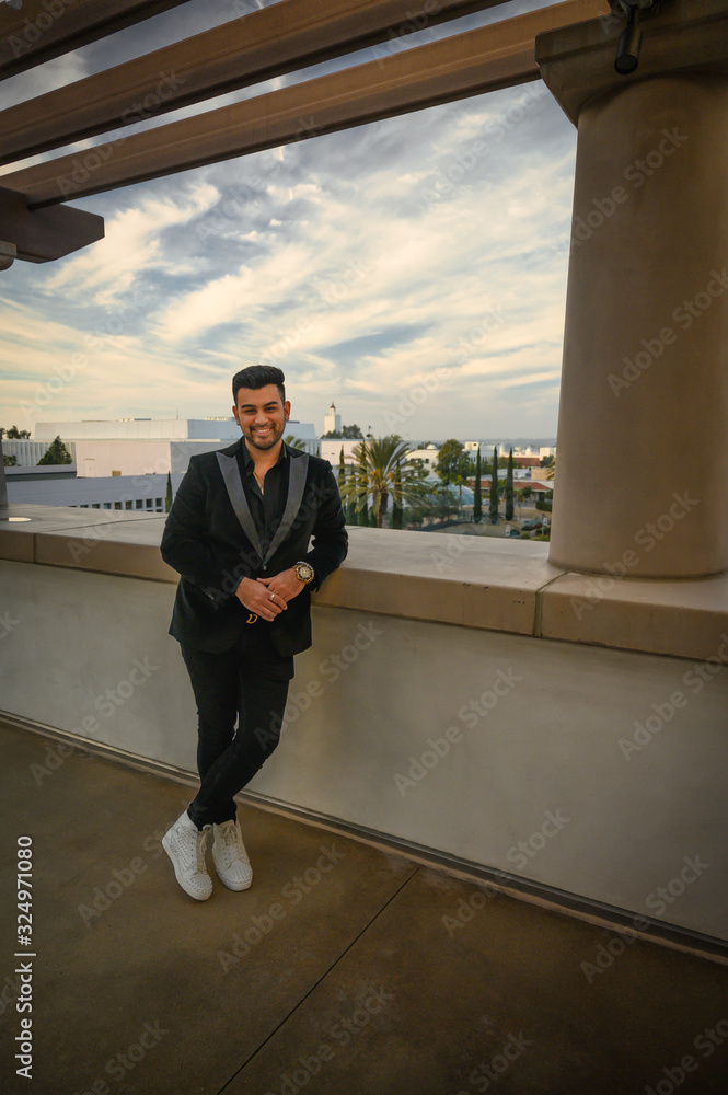 Hot young male model in suit poses at SDSU college campus in San Diego ...