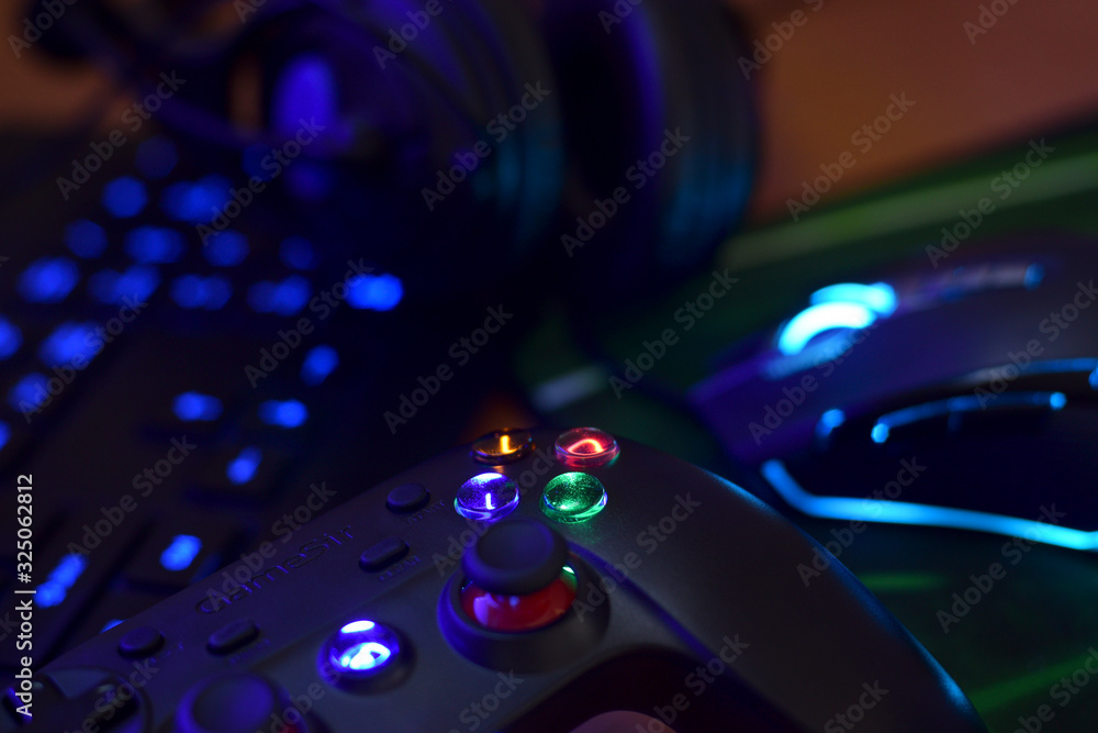 Gamesir g3s video game controller and Bloody p93 gaming mouse on office ...