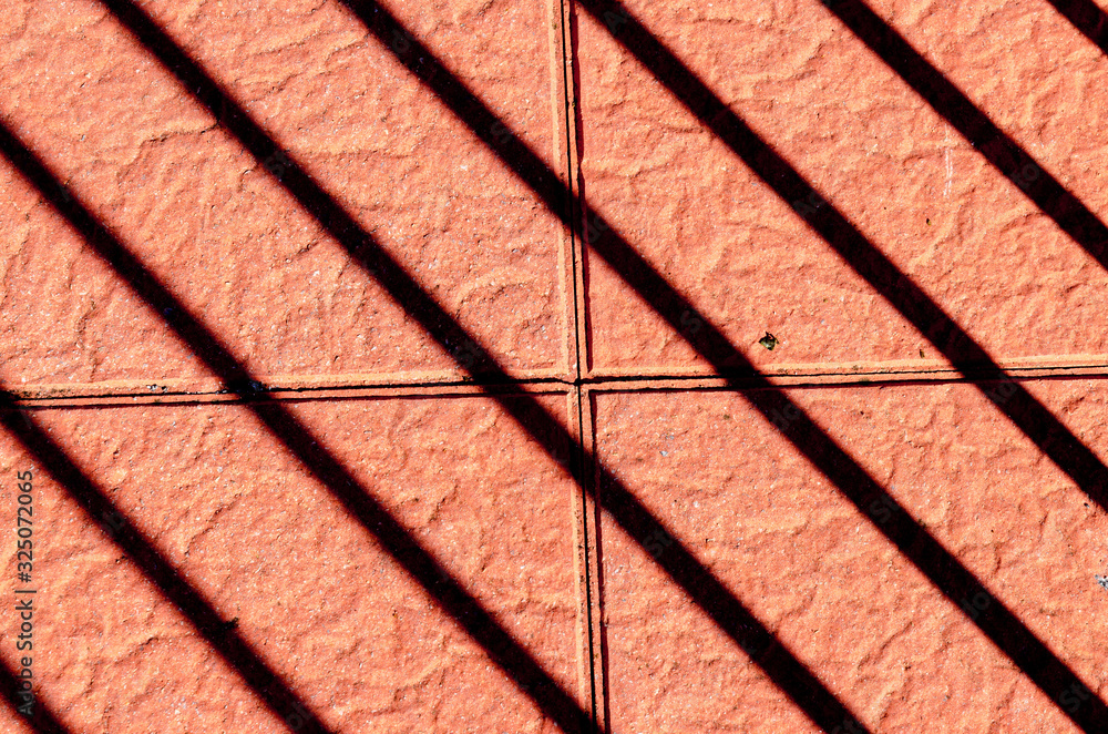 Abstract background, dark oblique longitudinal lines on the surface ...