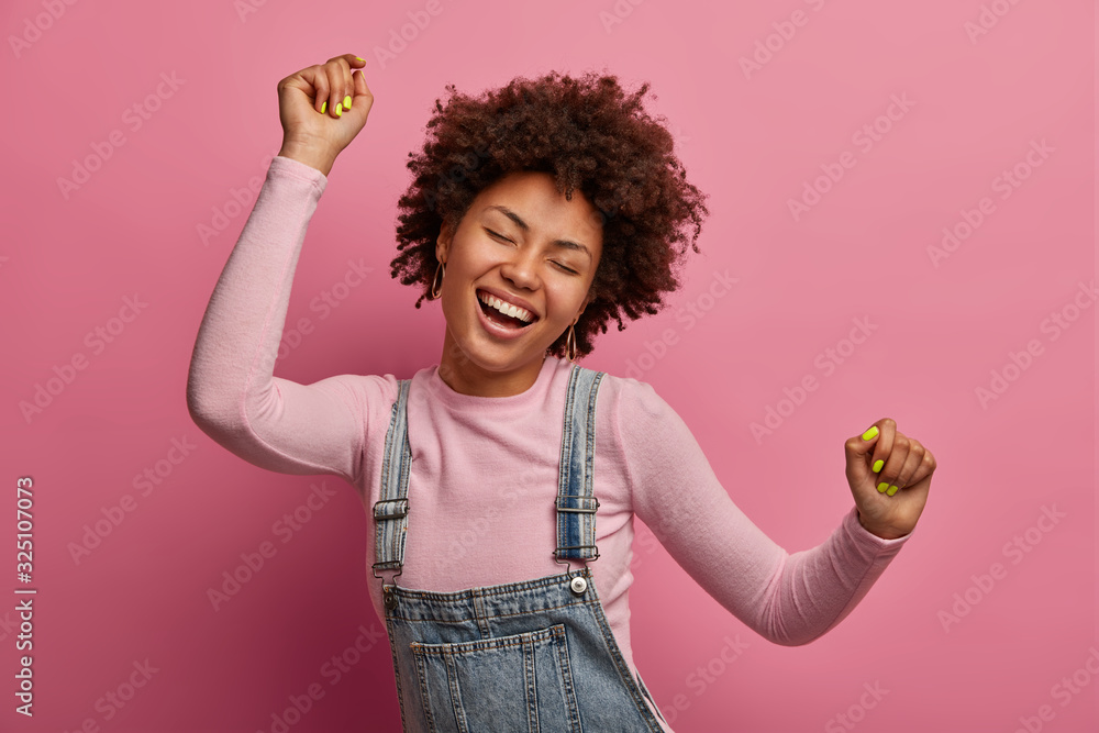 Happy Dark Skinned Girl Enjoys Every Moment Of Life Dances And Moves