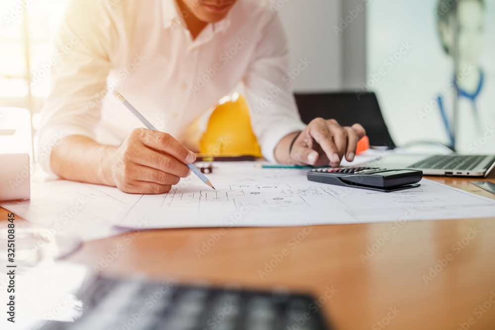 Engineer work together at meeting and planning construction projects on ...