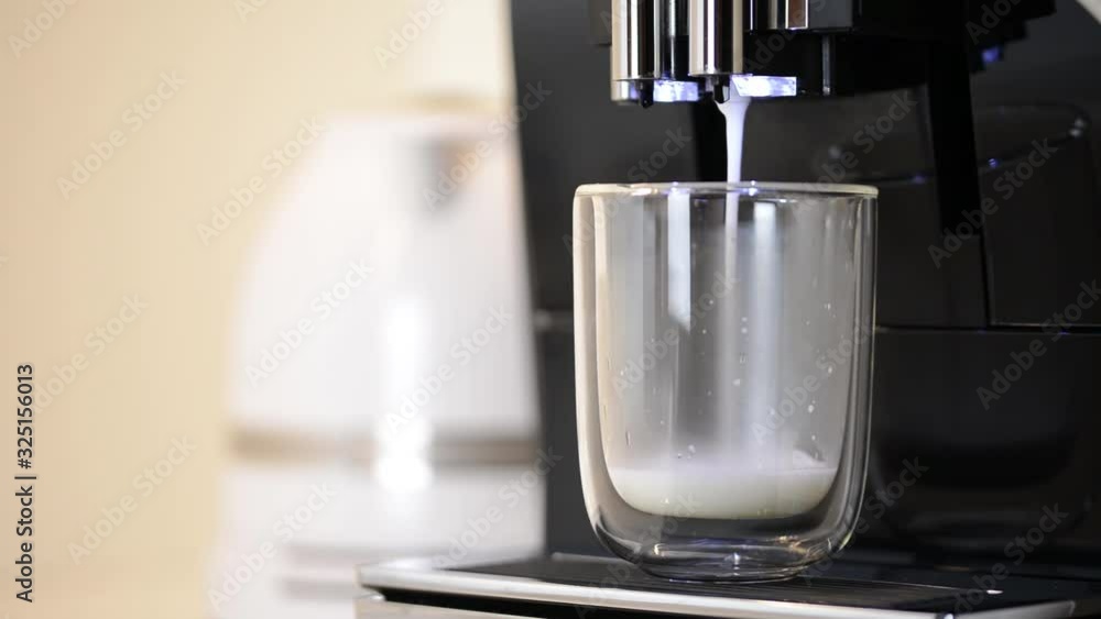 Close-up of the full process of making latte coffee from modern coffee ...