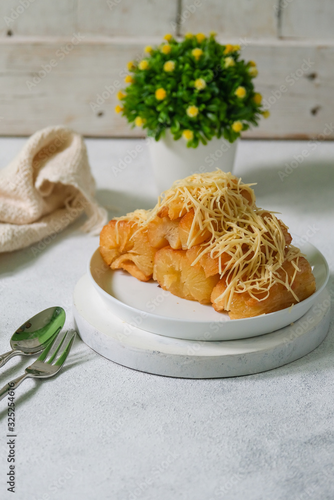 Deep fried cassava root. Brazilian Mandioca Frita (deep fried cassava ...