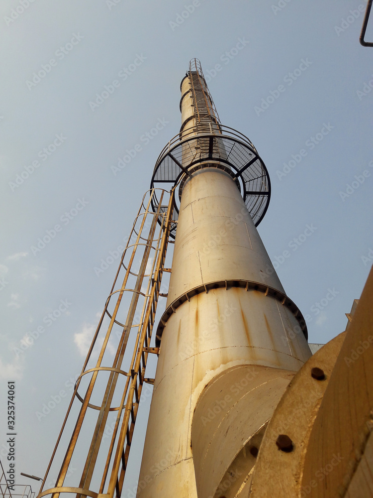 lower view boiler stack in power plant, air pollution concept Stock ...