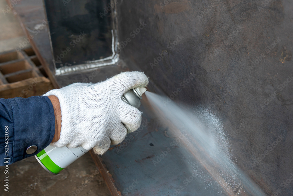 Step to use spray White Contrast on the welded surface before ...