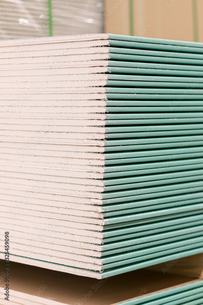 Drywall racks in a hardware store. repair and construction concept ...