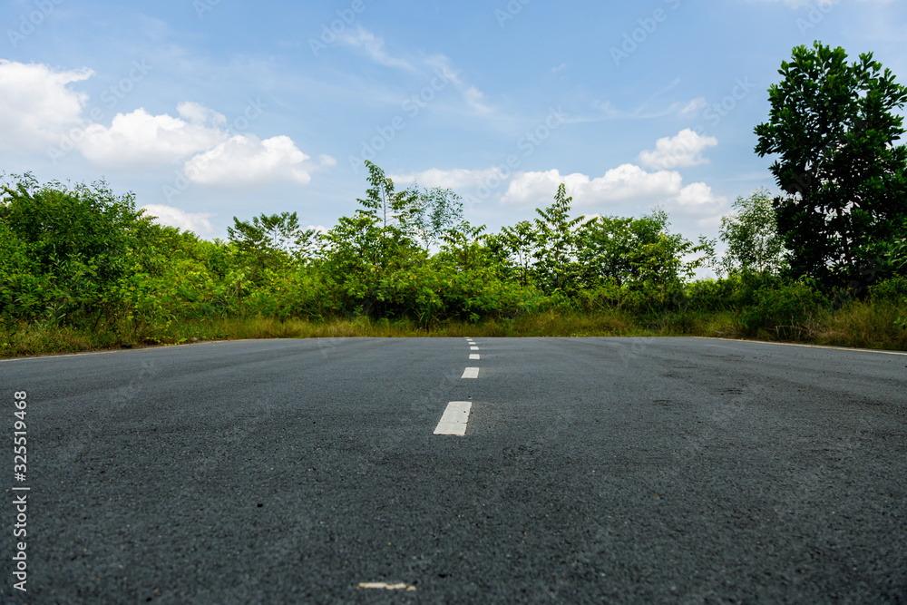 A road to nowhere in the Malaysian rainforest. The street was build but ...